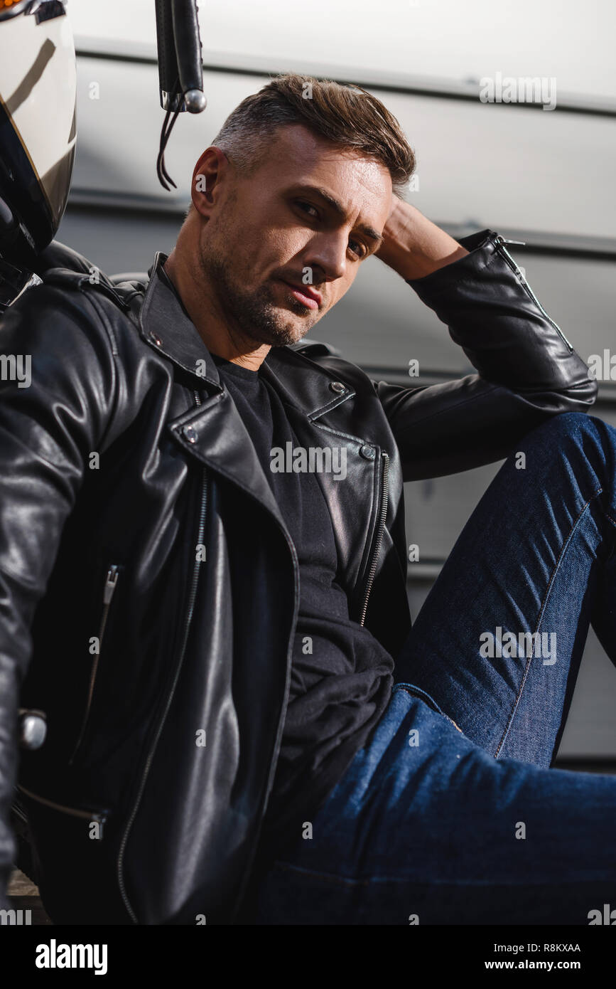 Posing with motorcycle hi-res stock photography and images - Alamy