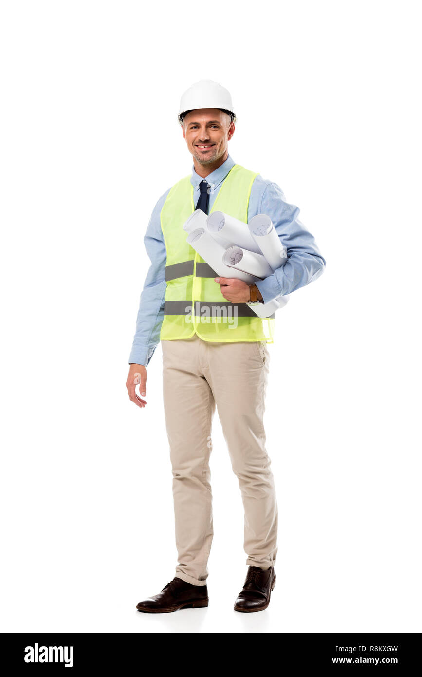 handsome engineer looking at camera and holding blueprints isolated on ...