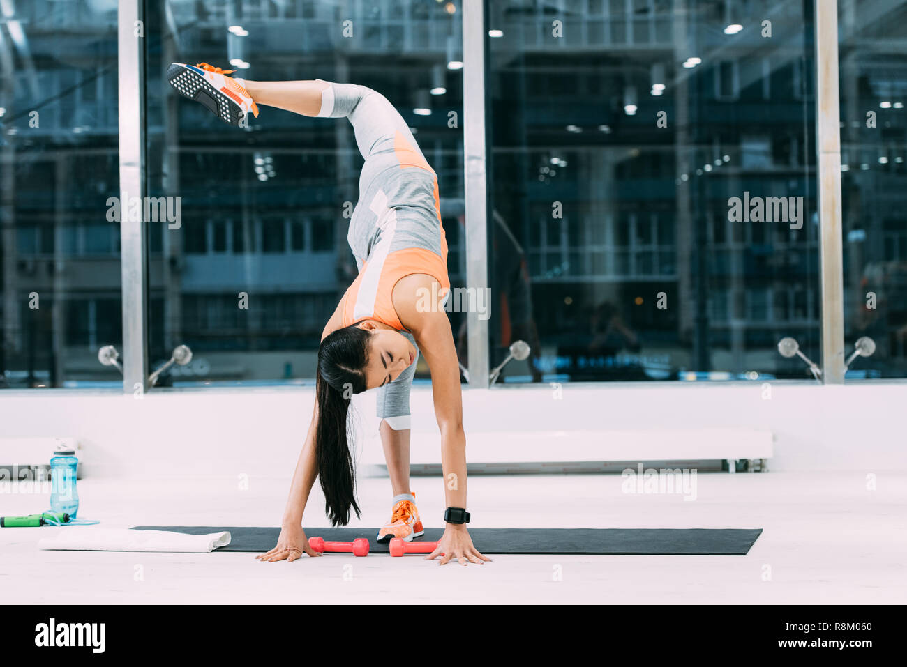 Fitness asian girl doing stretch hi-res stock photography and images ...