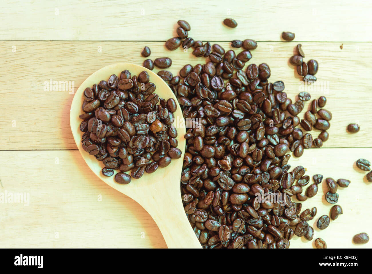 coffee bean on wood ladle Stock Photo - Alamy