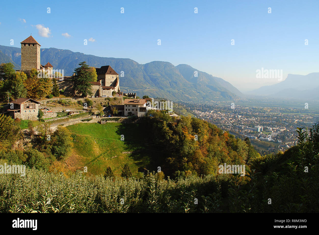 Tyrol Castle in Tirolo, South Tyrol, Italy and a view in the vally with ...