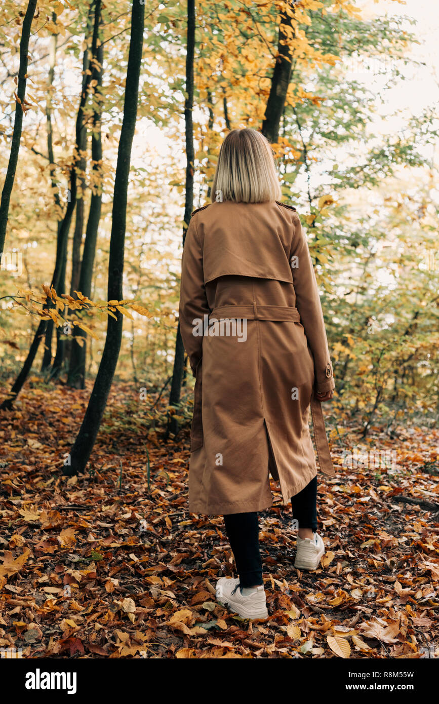 Back view of woman walking hi-res stock photography and images - Alamy