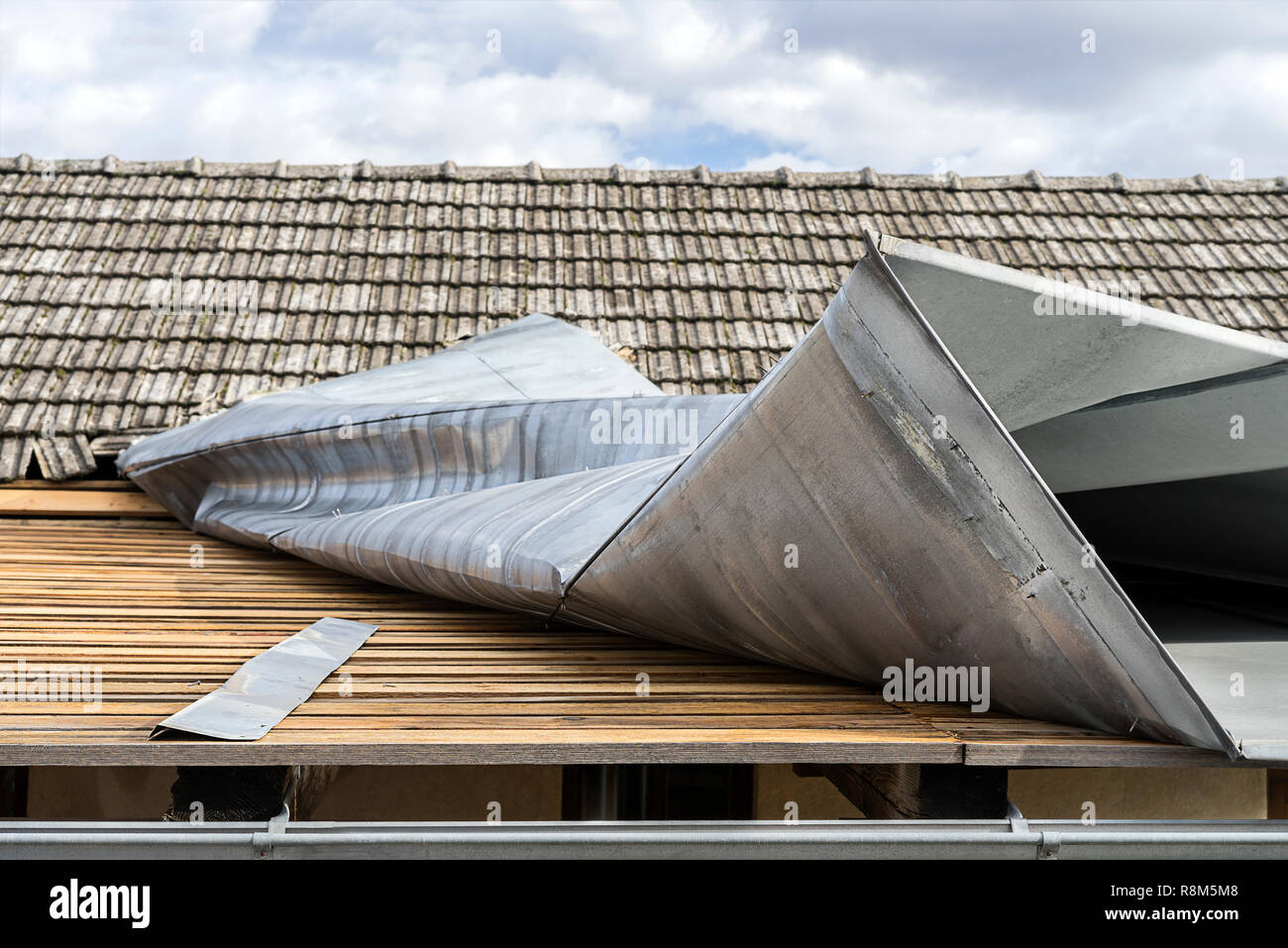 Metal roof top demolished by a wind.jpg Stock Photo - Alamy