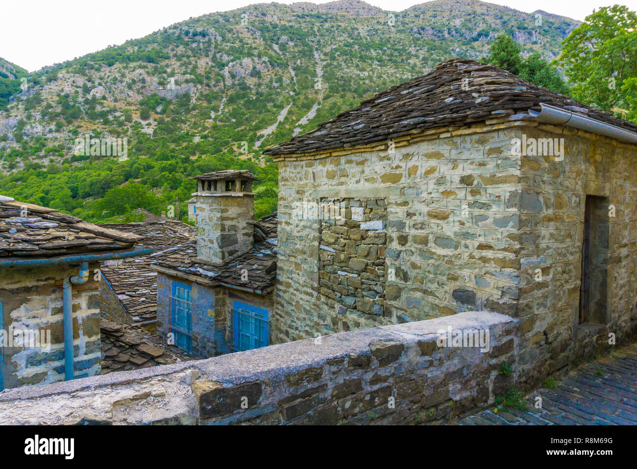 A traditional stone house in Tsepelovo village in Zagorochoria of Epirus in Greece Stock Photo ...