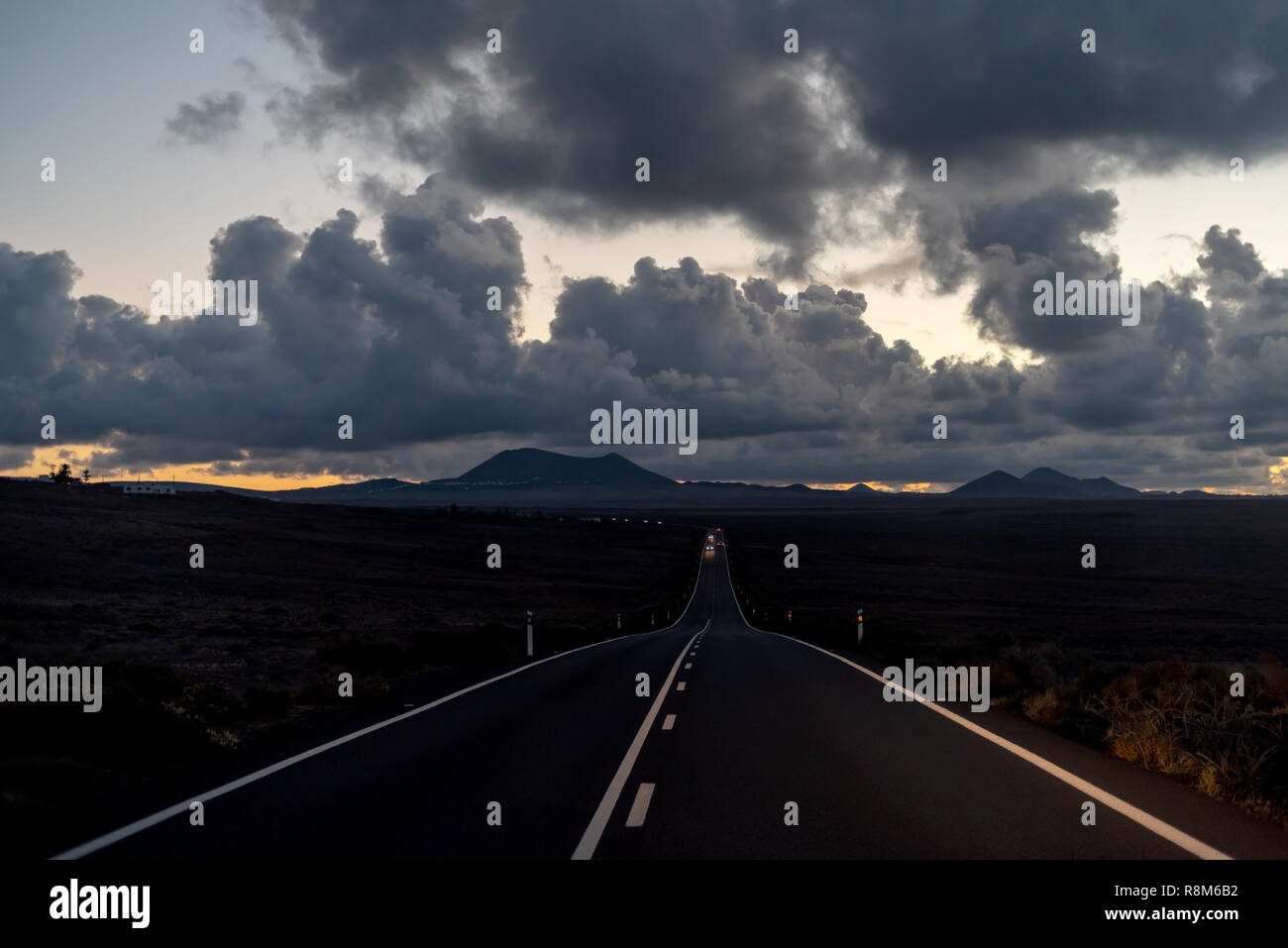 Rural road at dark night with headlights Stock Photo - Alamy