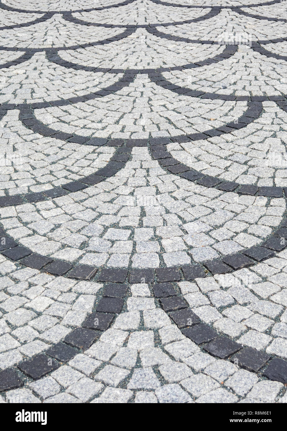 Paving stones in scale pattern Stock Photo - Alamy