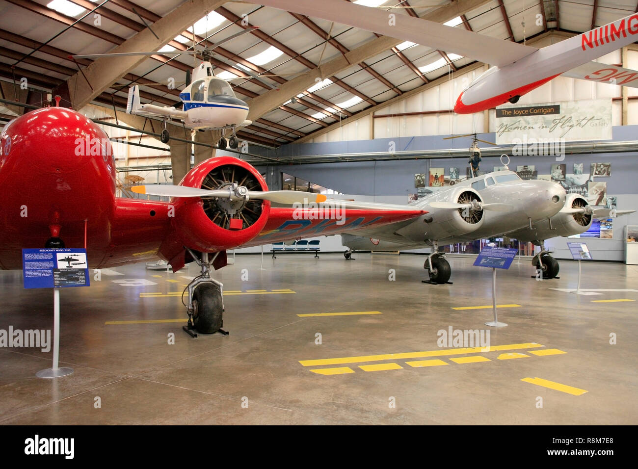 Beechcraft Model S18D twin-radial engine plane and Lockheed Electra ...