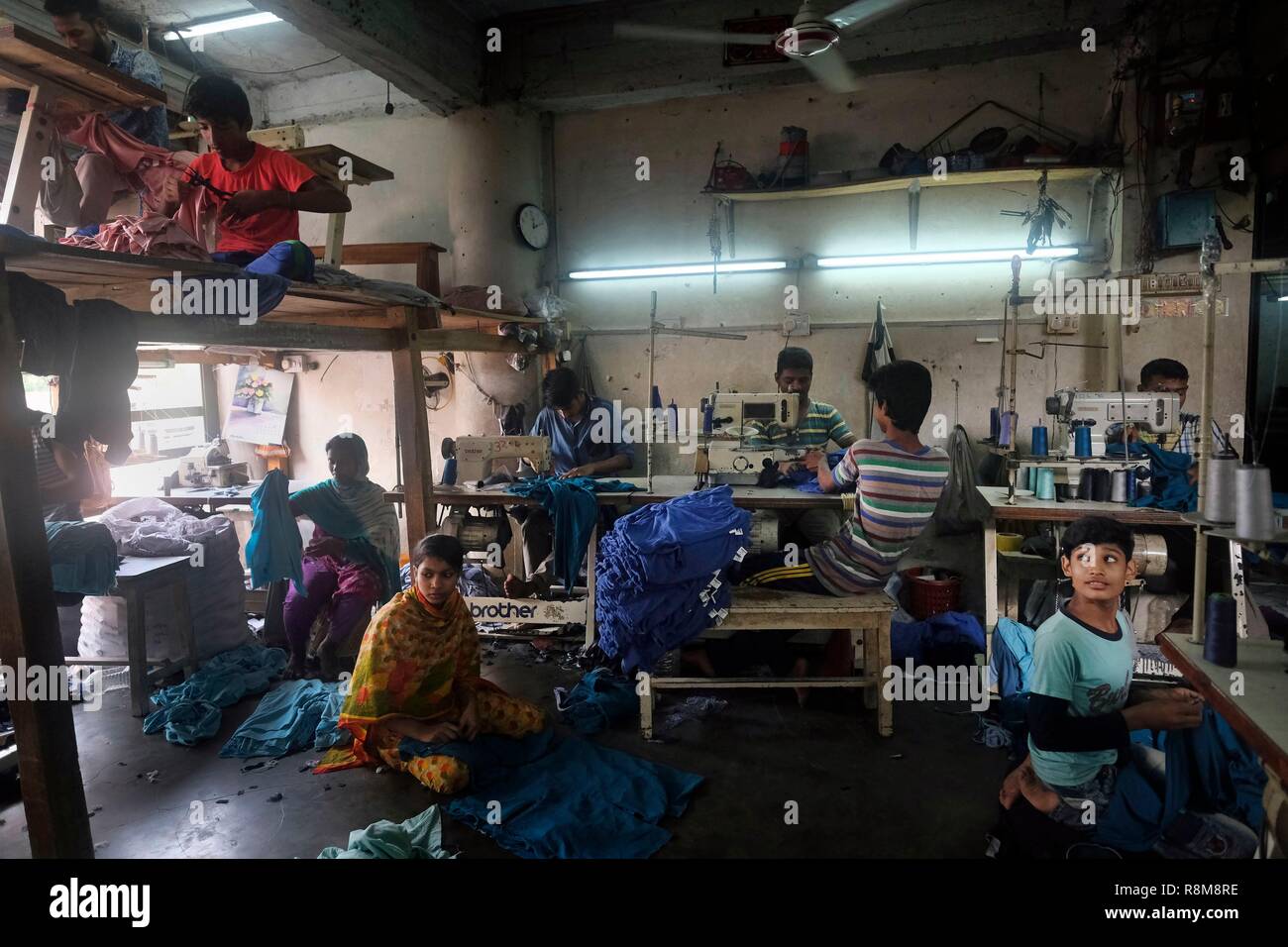 Child labor factory sewing hi-res stock photography and images - Alamy