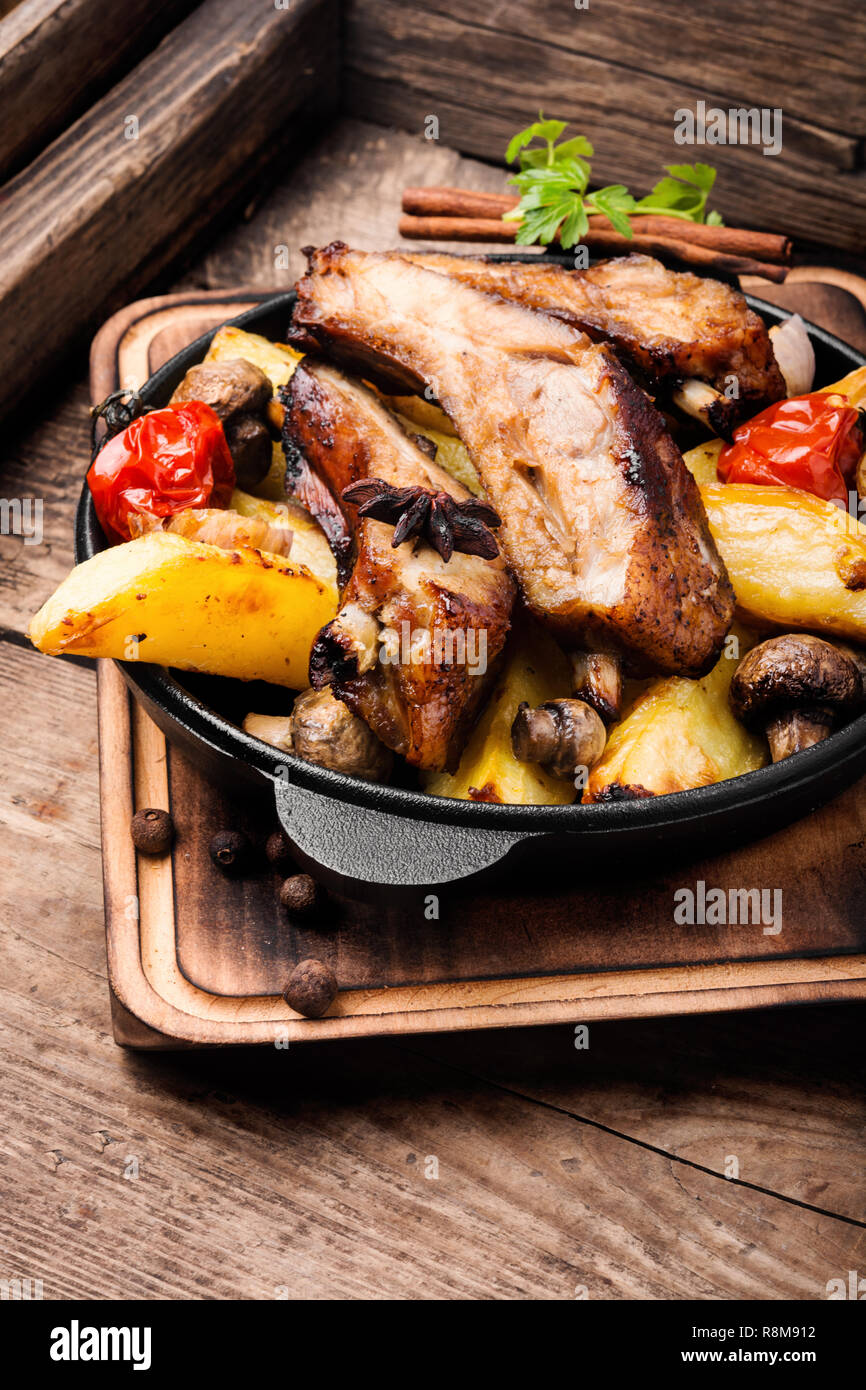 Grilled ribs on an old vintage pan.Summer BBQ Stock Photo - Alamy
