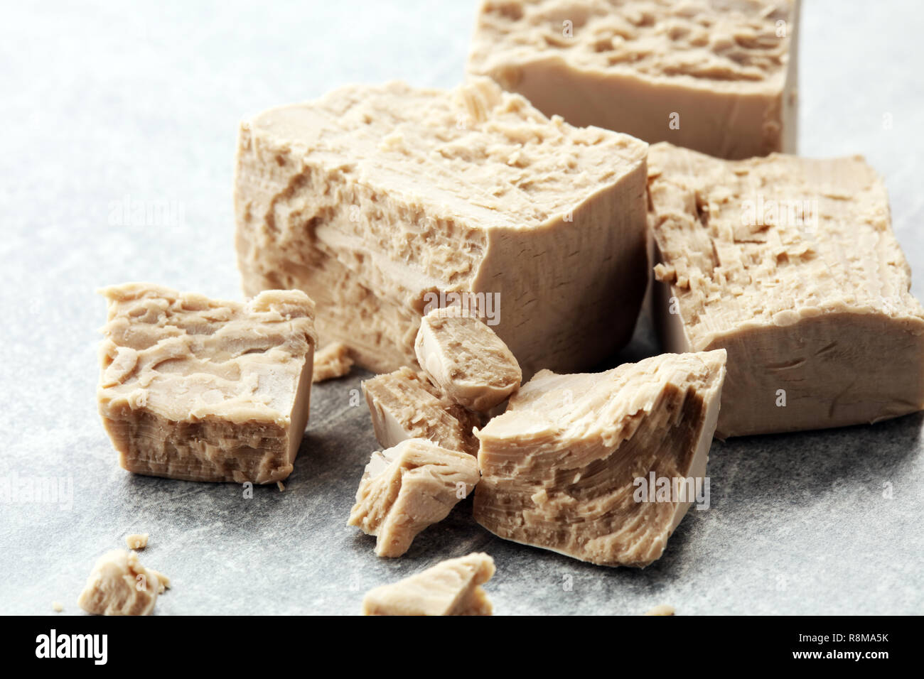 Dry yeast crumbled and yeast block for baking Stock Photo - Alamy