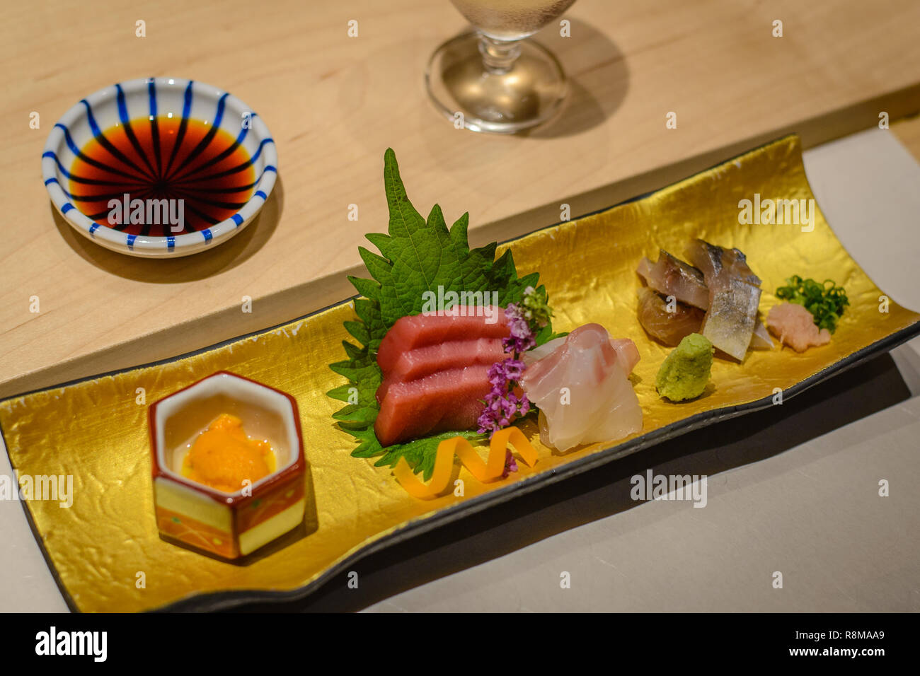 sashimi raw fish course with sake and tuna and sea urchin uni Stock ...