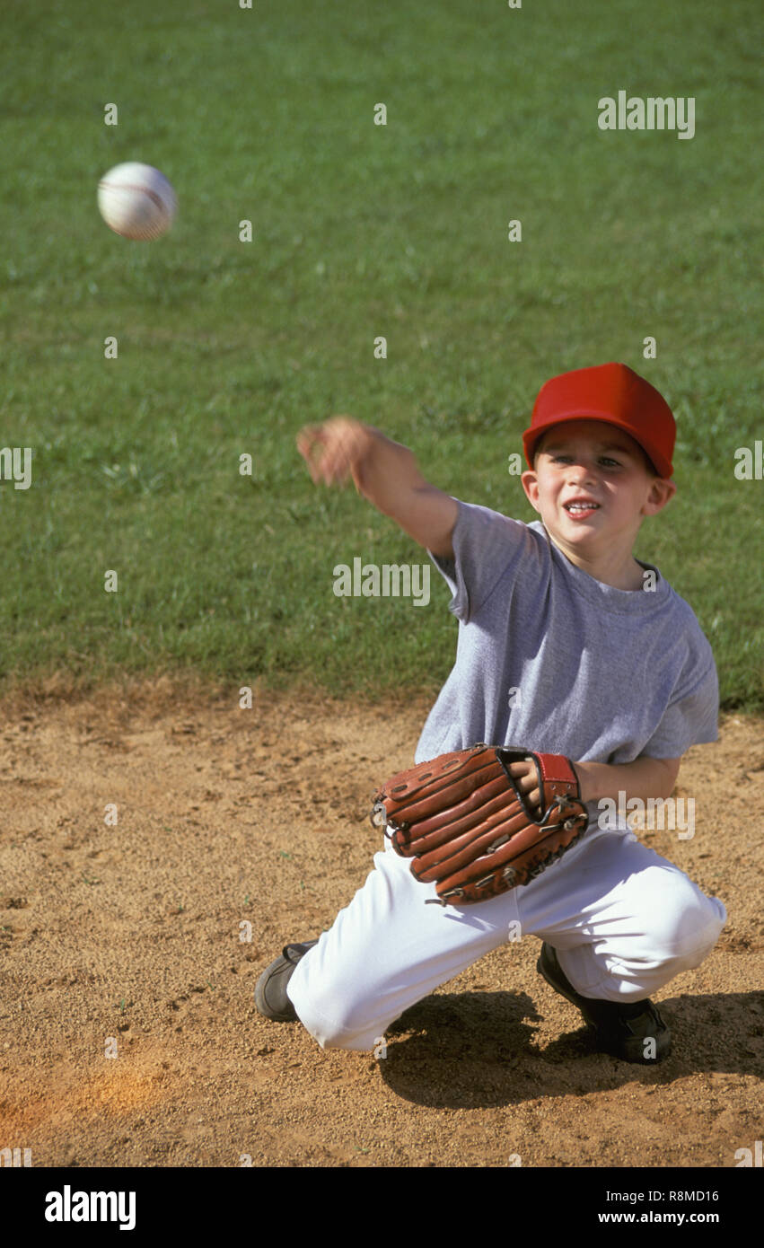 Young Boy Throwing a Baseball, USA Stock Photo - Alamy