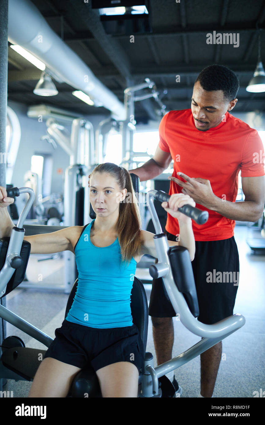 Exercising on equipment Stock Photo - Alamy
