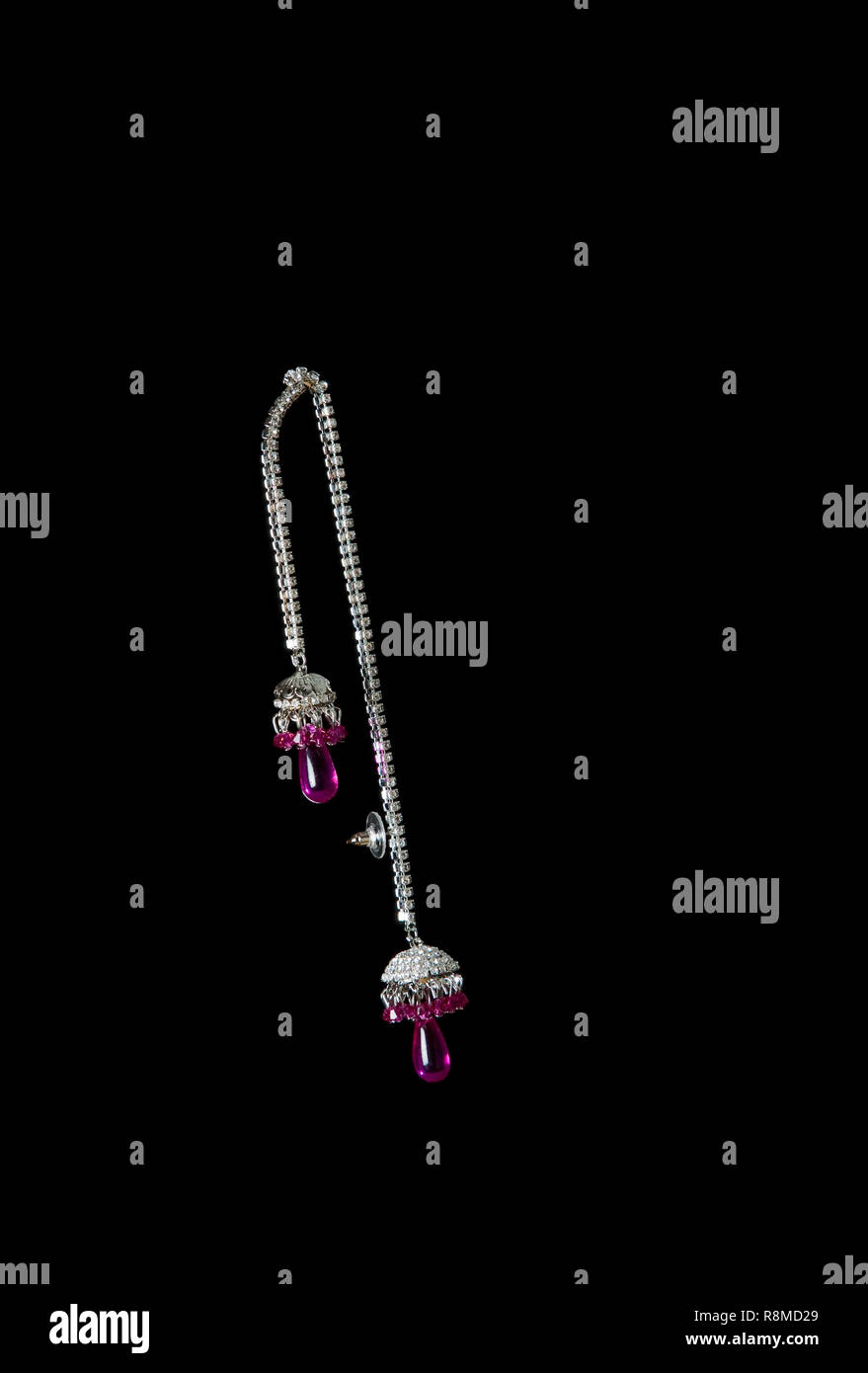 Indian earrings with chain Stock Photo - Alamy