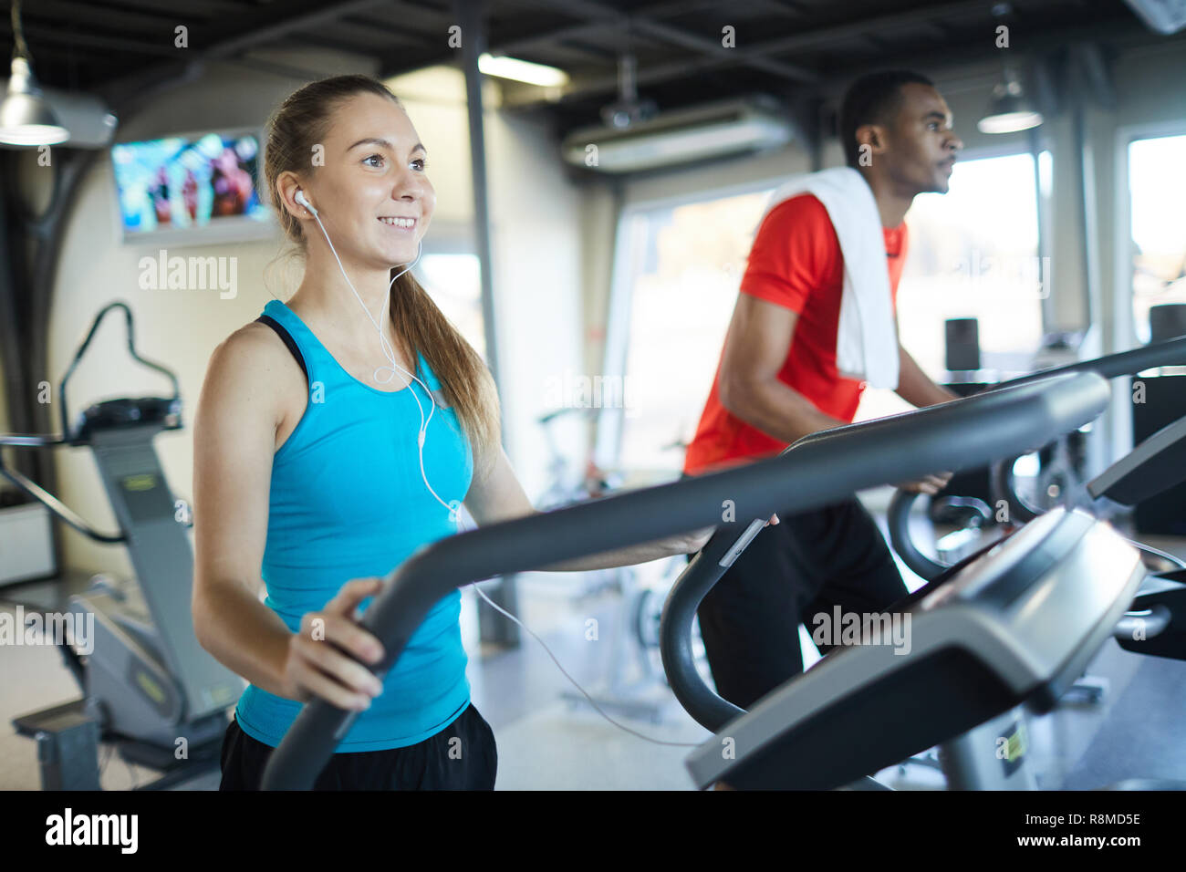 Running on treadmill Stock Photo - Alamy