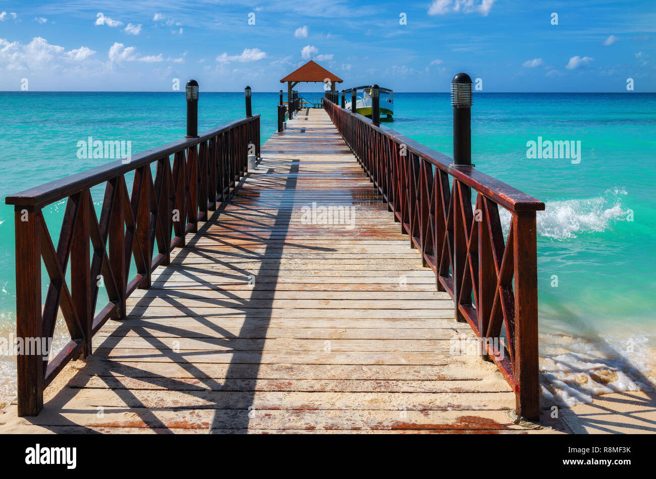 Wooden pier with turquoise sea background on caribbean island Stock ...