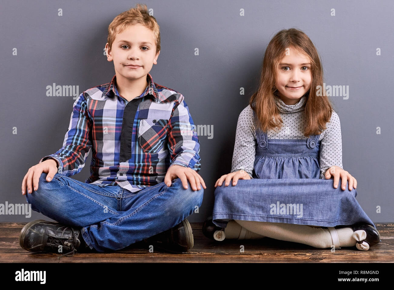 Little Girl Sitting Cross Legged Side View