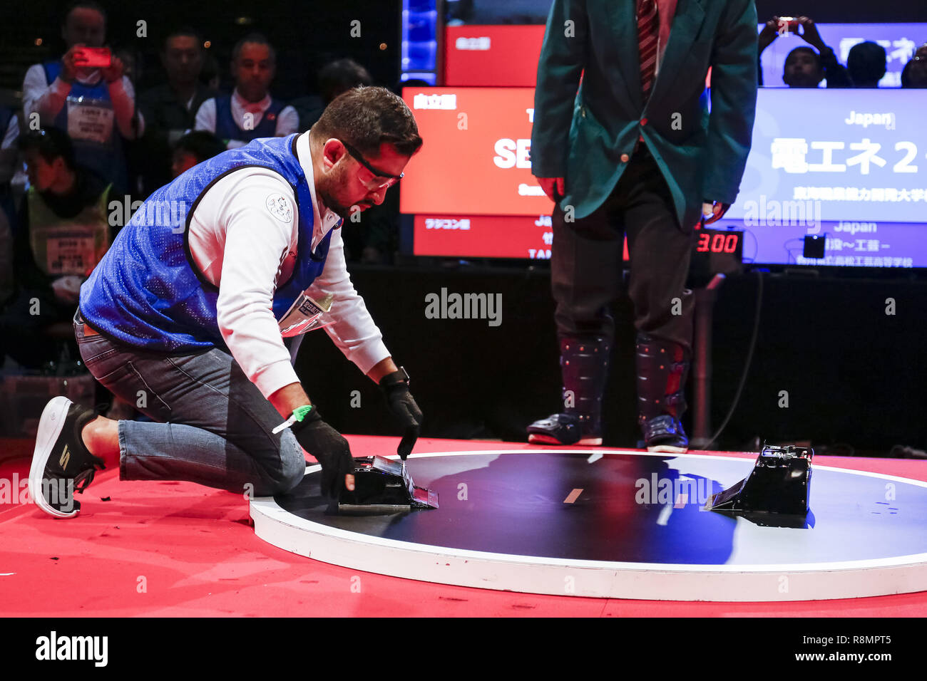 Tokyo, Japan. 16th Dec, 2018. A robot operator competes during the ...