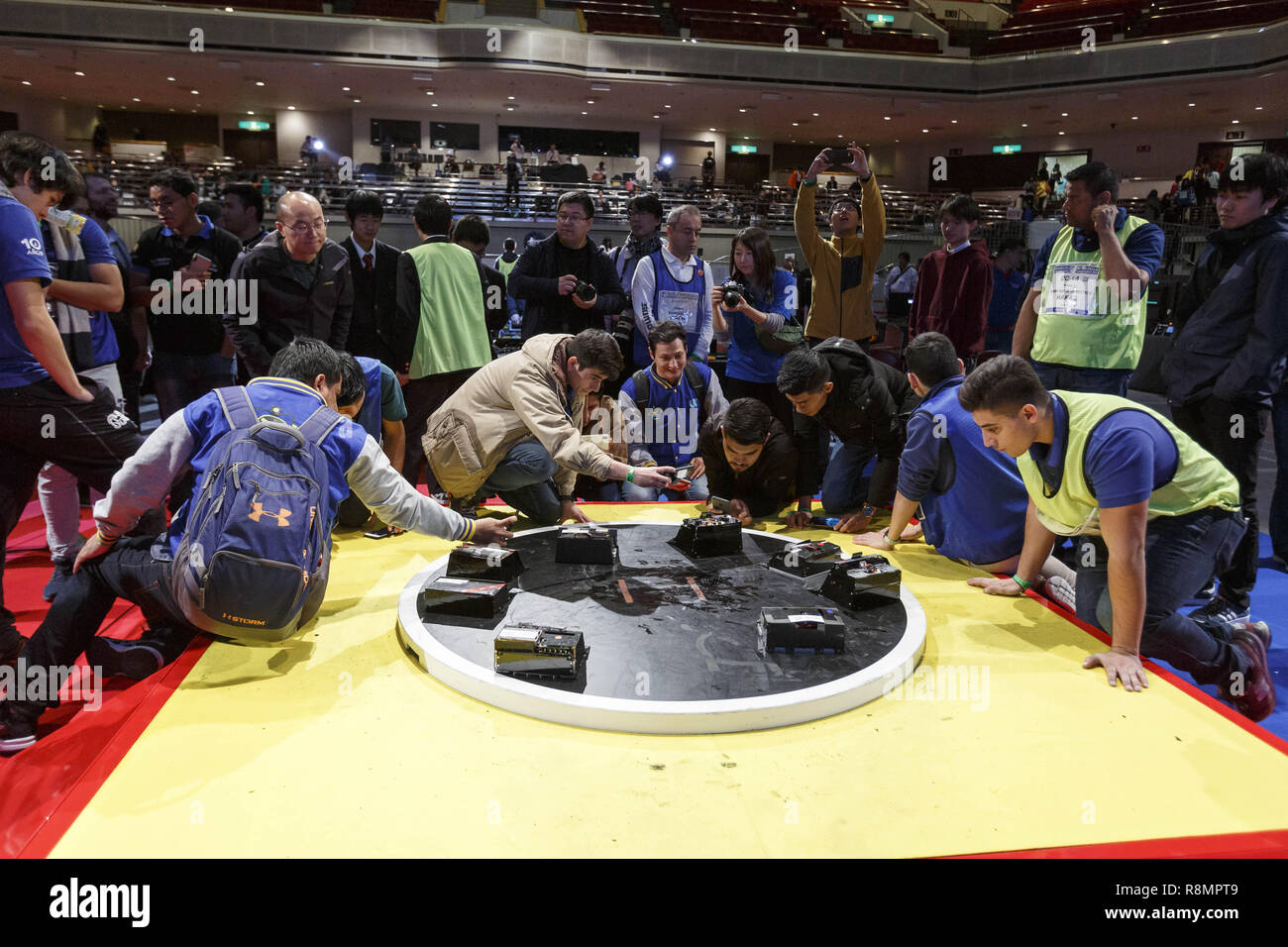Tokyo, Japan. 16th Dec, 2018. Robot operators take pictures of sumo ...