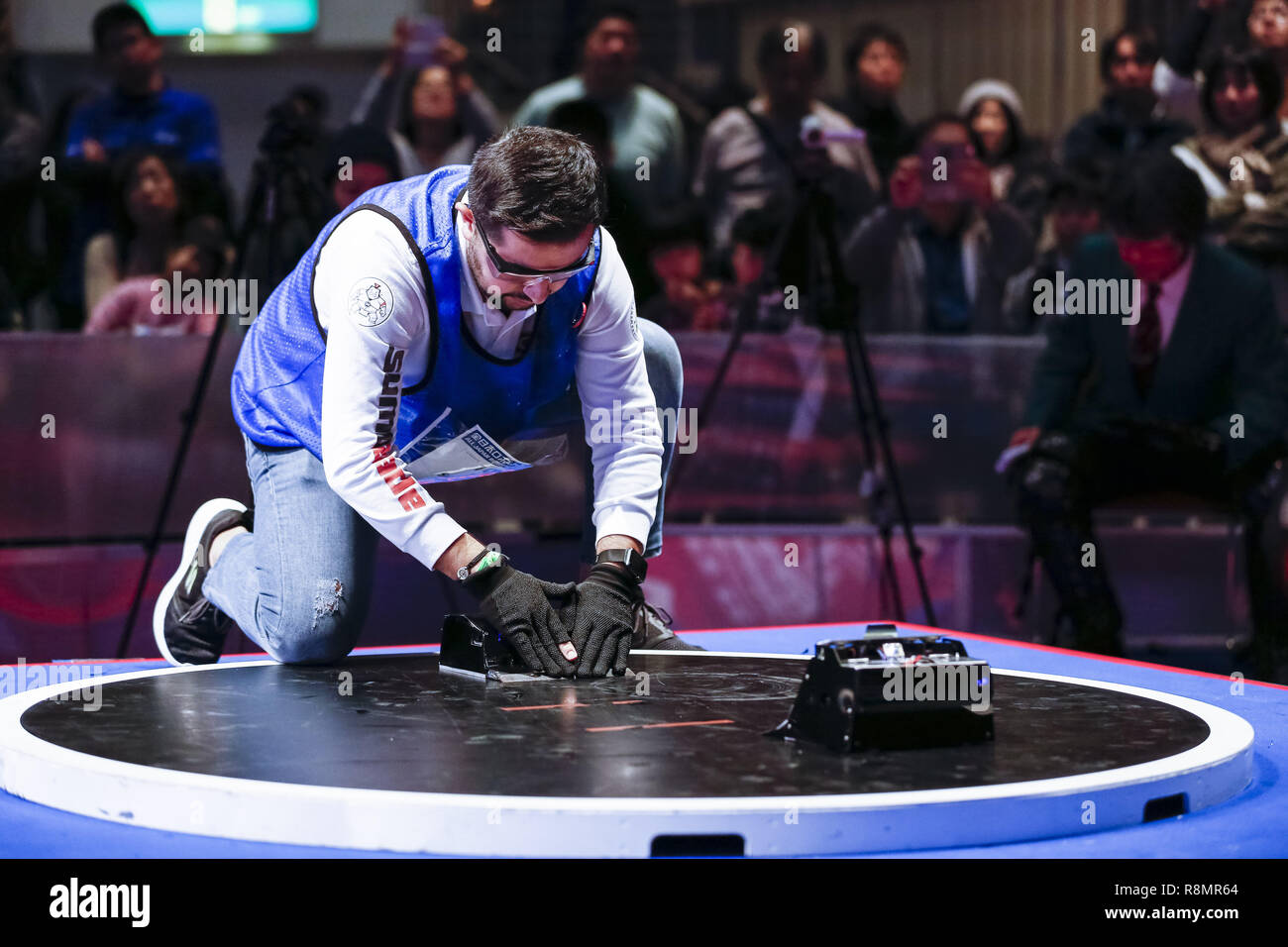 Tokyo, Japan. 16th Dec, 2018. A robot operator competes during the ...