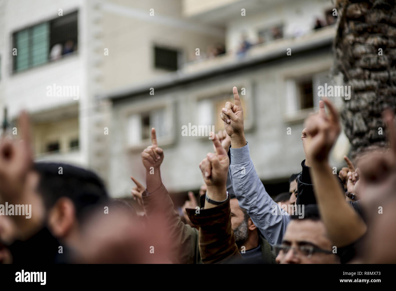Gaza city, Gaza. 16th Dec 2018. Palestinians seen showing one finger in ...