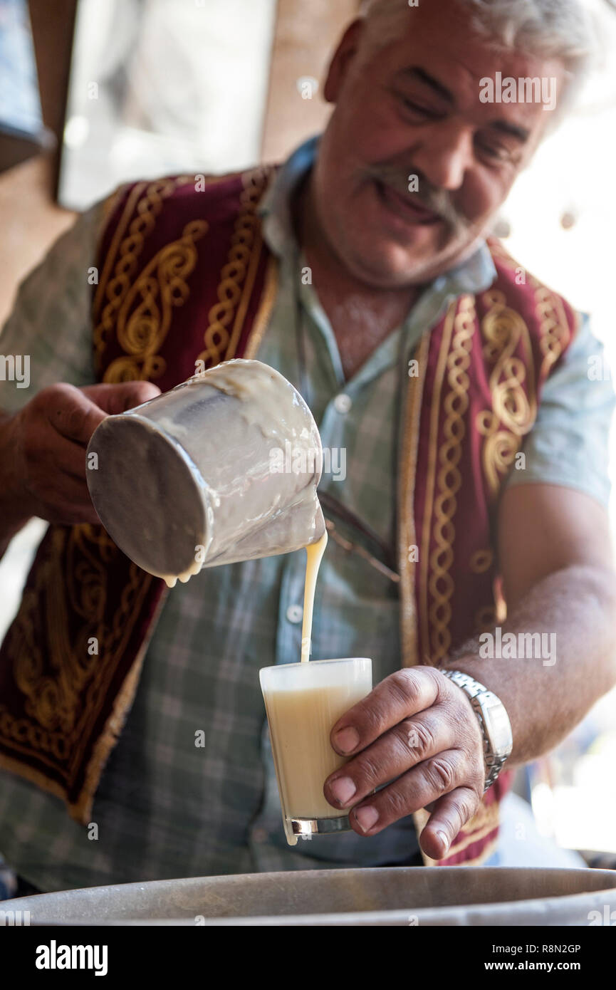 Huseyin the Boza maker of Ortahisar. Boza is a traditional Turkish ...