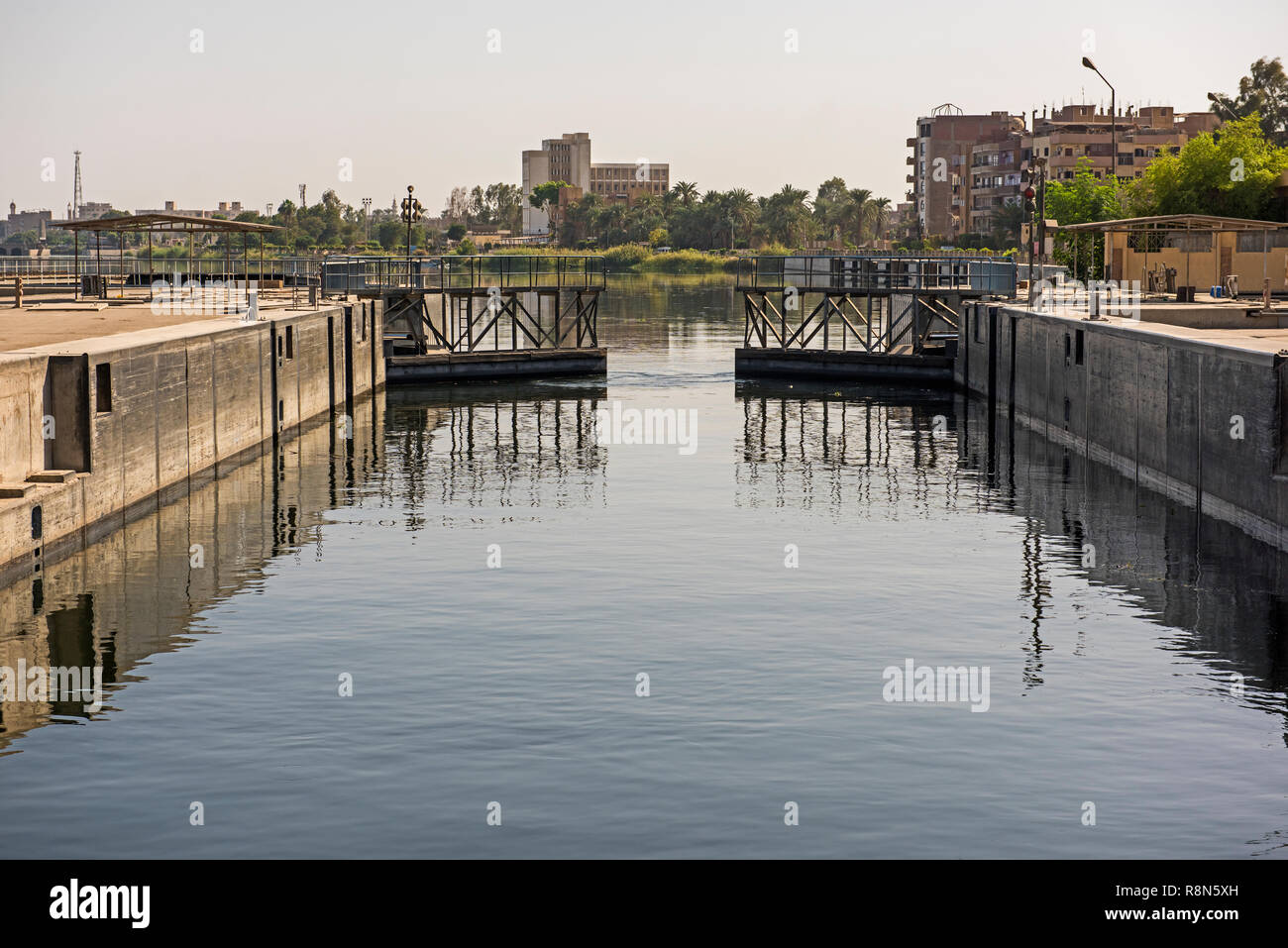 View across large wide shipping lock on river Nile in Egypt through ...