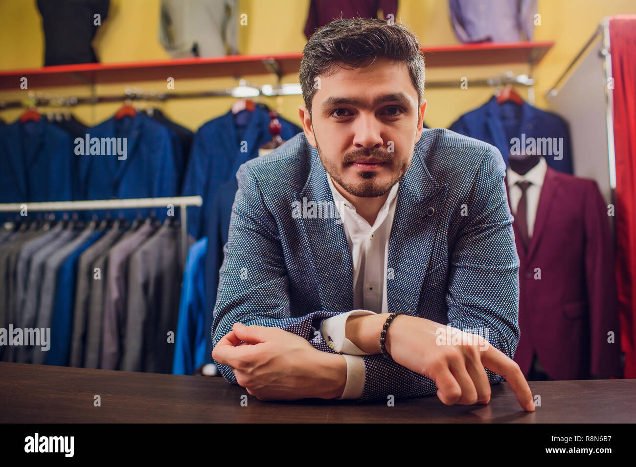 Tailor, tailoring. Men's suit, tailor in his workshop. Elegant man's ...