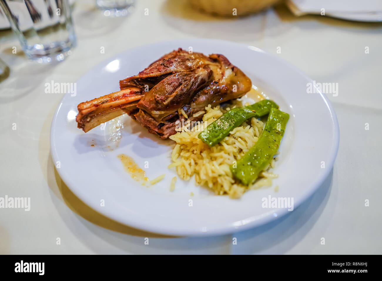 lamb shank with saffron rice middle eastern cuisine Stock Photo - Alamy