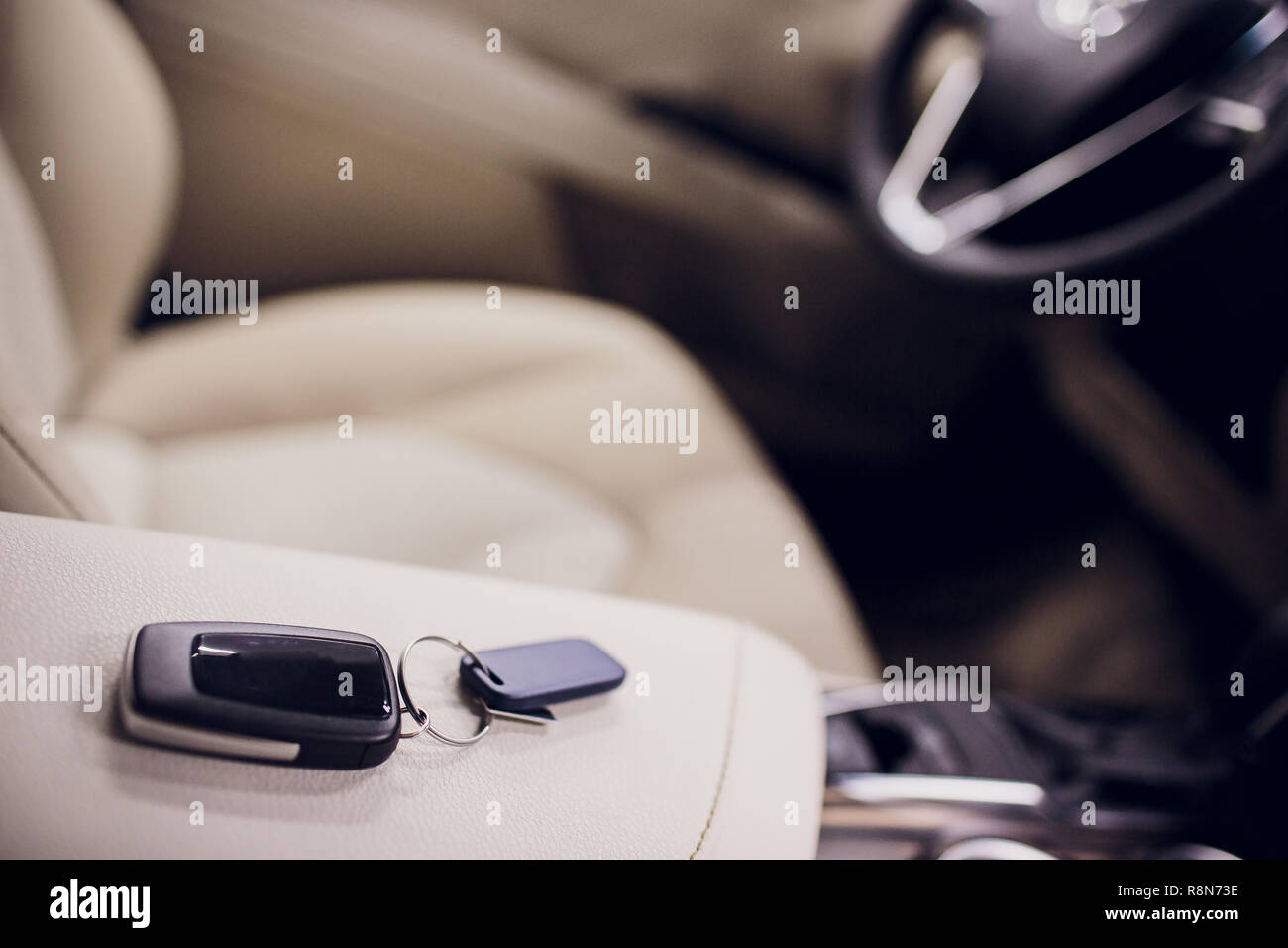 Passing car keys. Cropped closeup car dealer holding out car keys ...