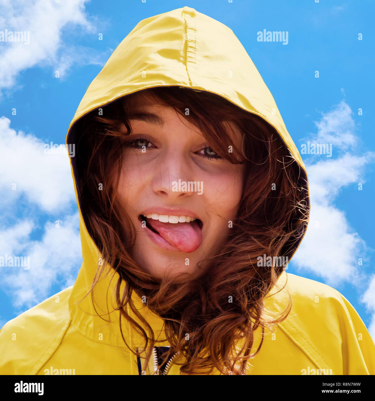 Woman sticking tongue out happy hi-res stock photography and images - Alamy
