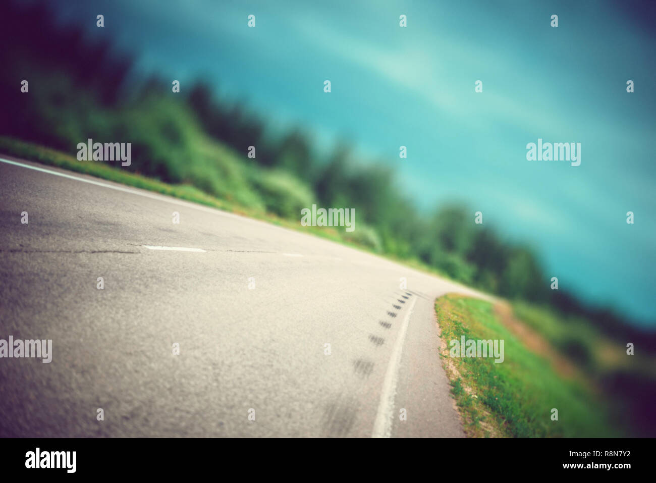 Road in forest blur tilt effect Stock Photo - Alamy