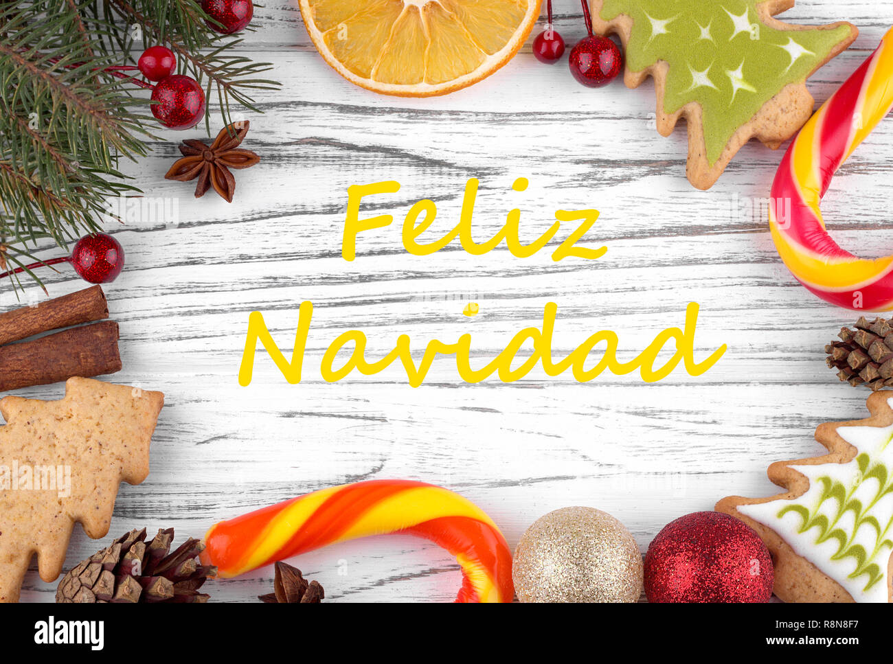 Greeting card with text Merry Christmas in Spanish Stock Photo - Alamy