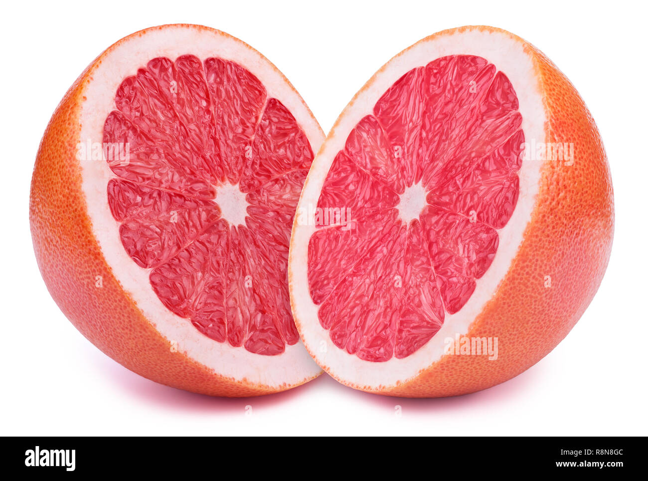 Halves of grapefruits isolated Stock Photo - Alamy