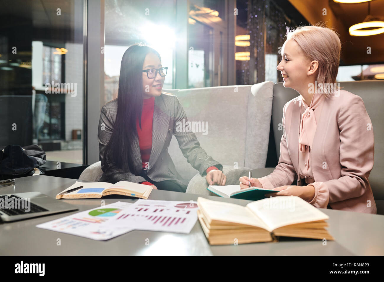 Businesswoman sitting an interview Stock Photo - Alamy