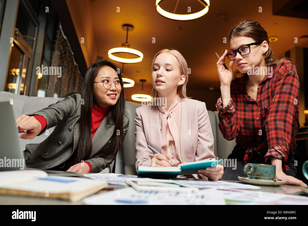 Women working in team Stock Photo - Alamy