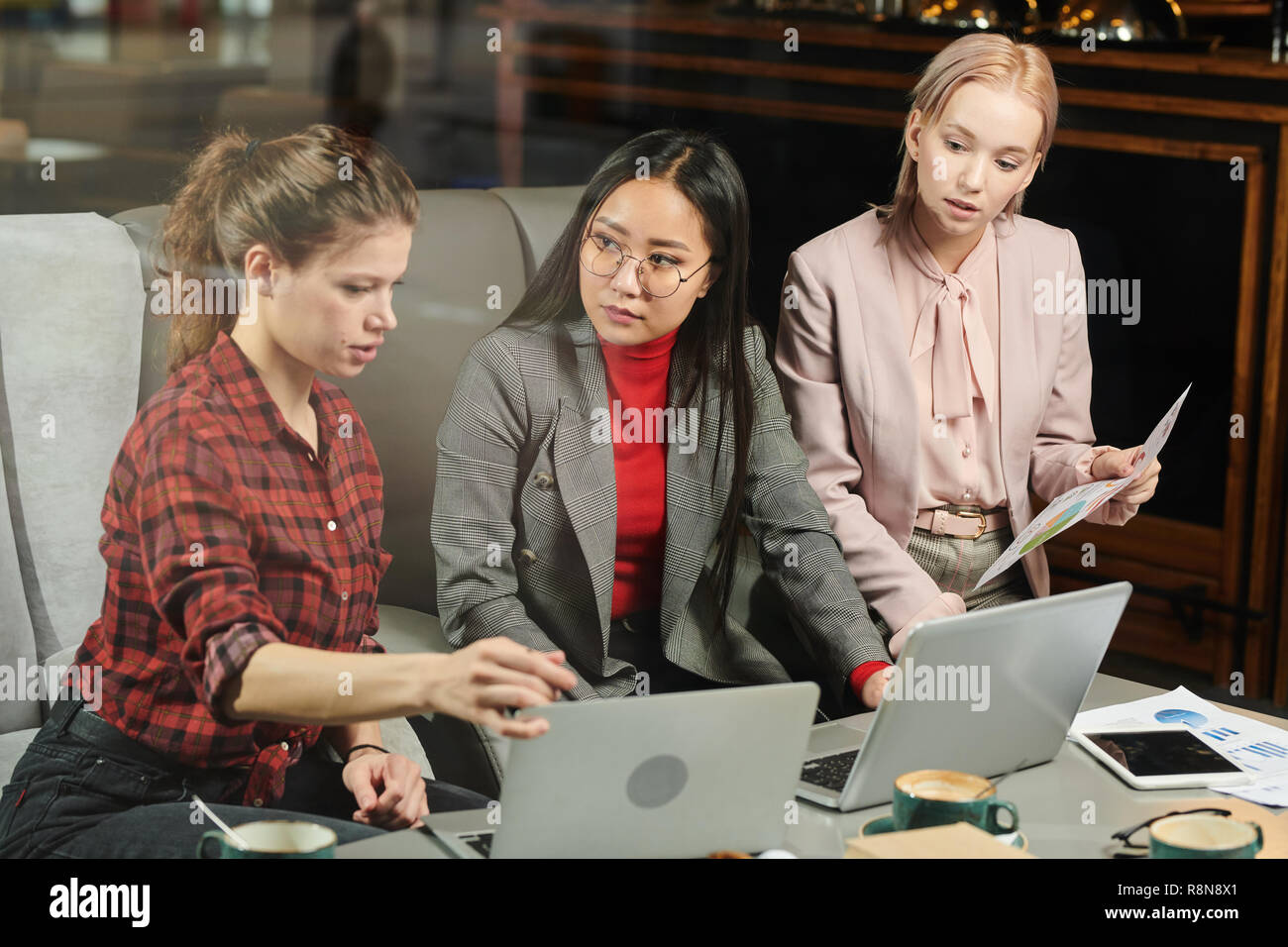 Students using laptop Stock Photo - Alamy