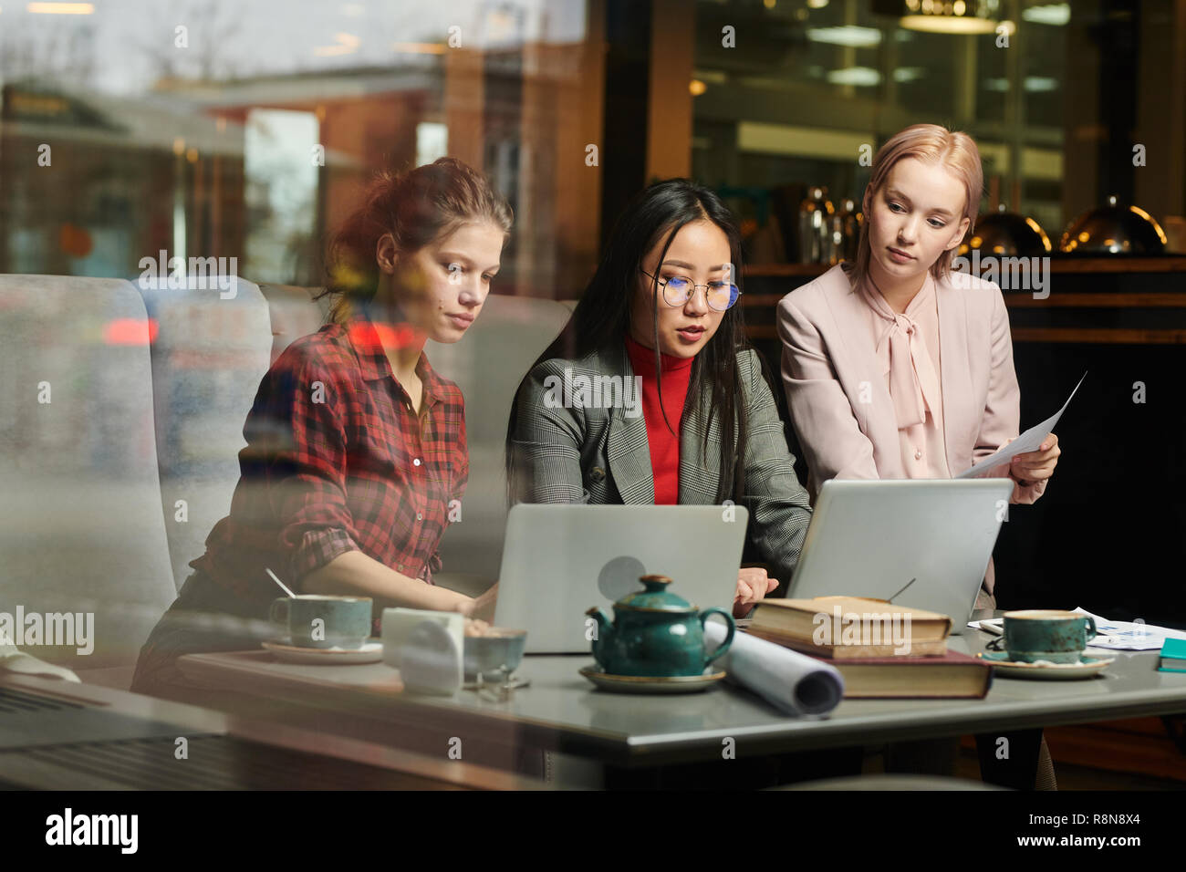 Student group discussion with laptop hi-res stock photography and ...