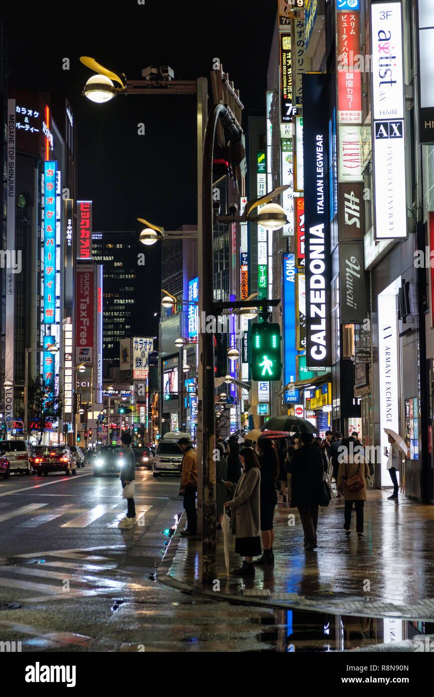 Shinjuku shopping area of at night, Tokyo, Japan Stock Photo - Alamy