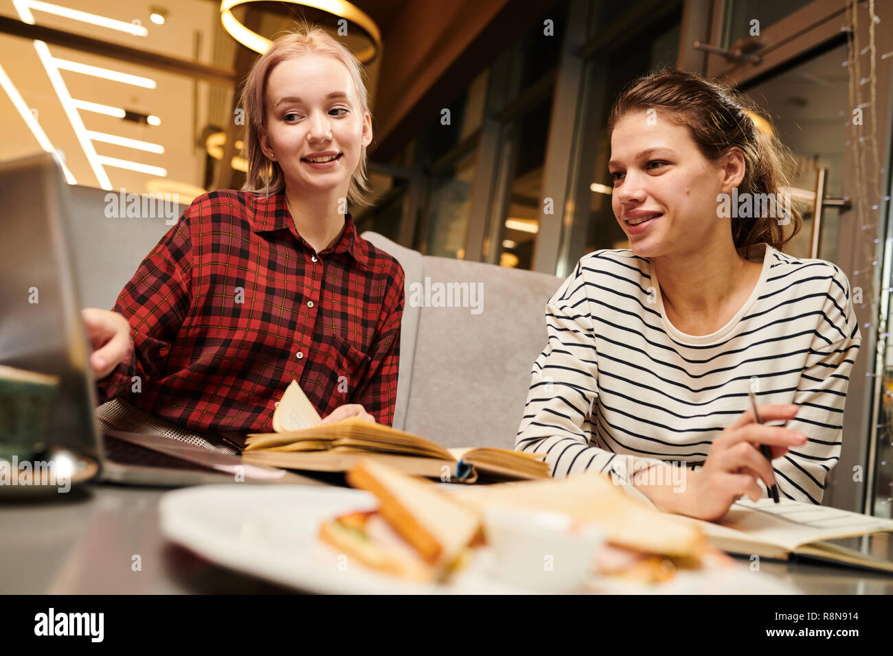 Friends have online conversation Stock Photo - Alamy