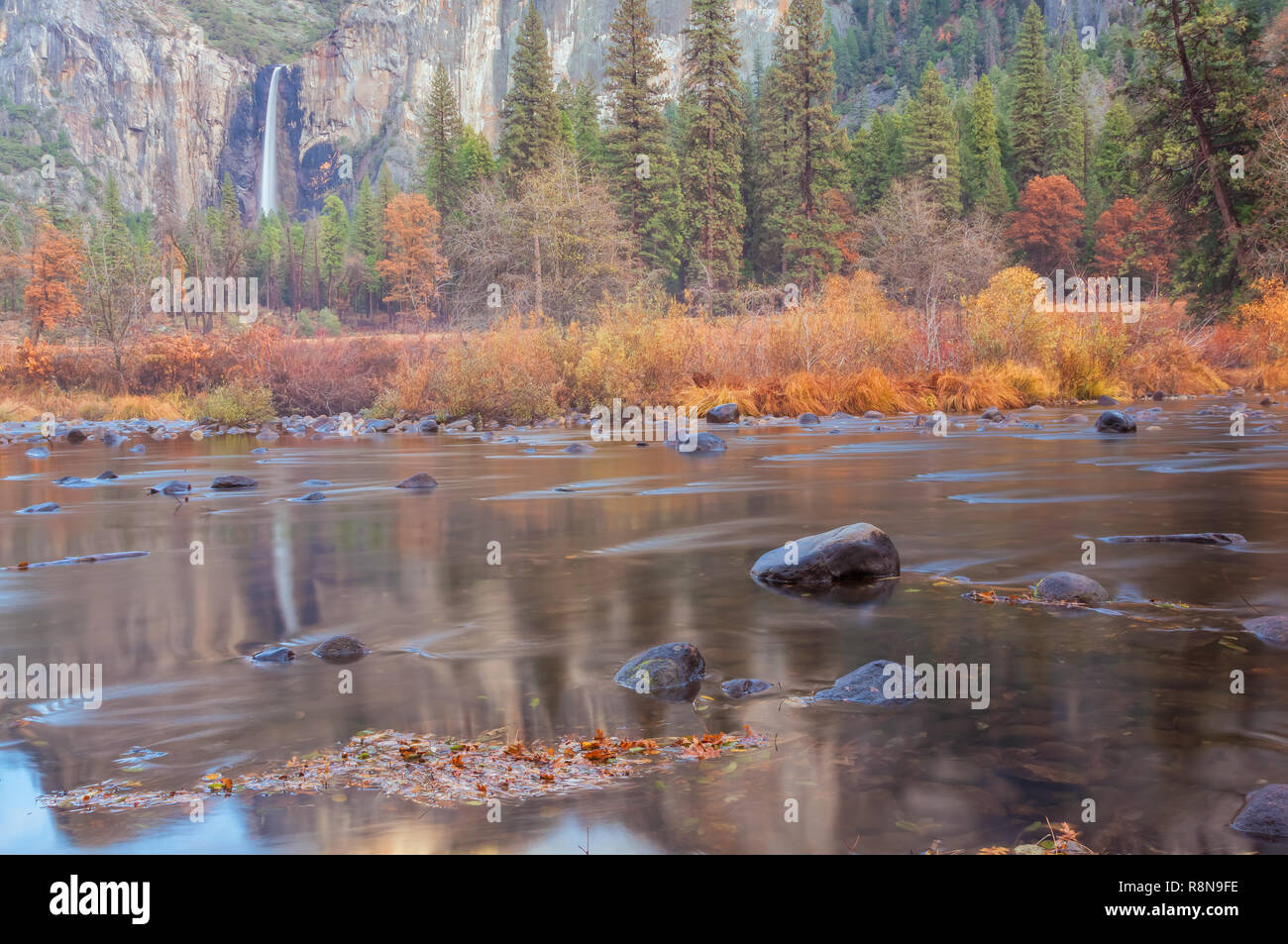 The Bridal Veil Falls and its reflection on the Merced River in ...