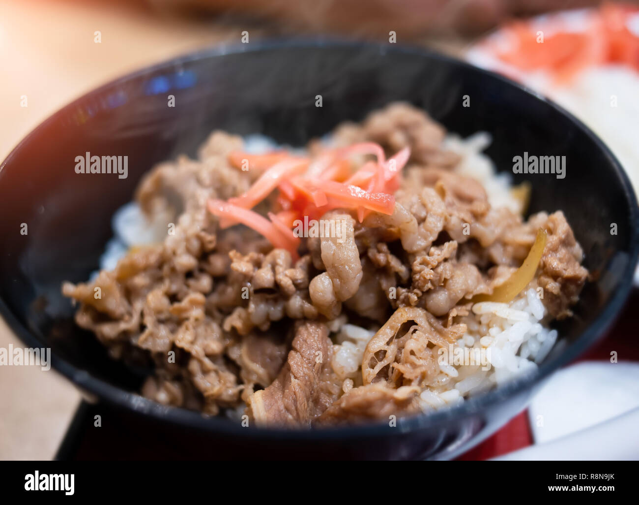 Simmer slice beef with rice in Japanese style gyudon in indoor low ...