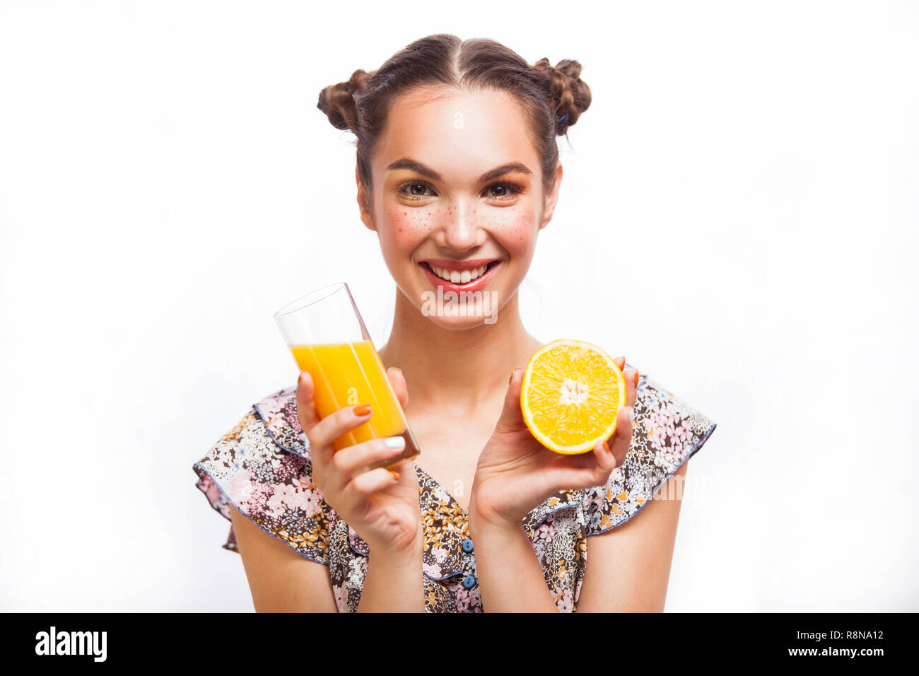 Woman drinking orange juice smiling happy excited. Beauty Teenager ...