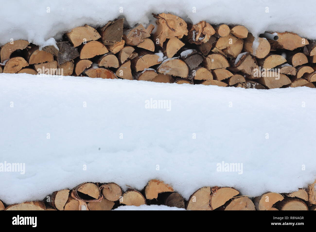 Snow covered firewood hi-res stock photography and images - Alamy