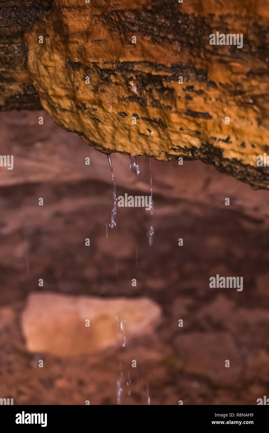 Water dripping off rock cliff hi-res stock photography and images - Alamy