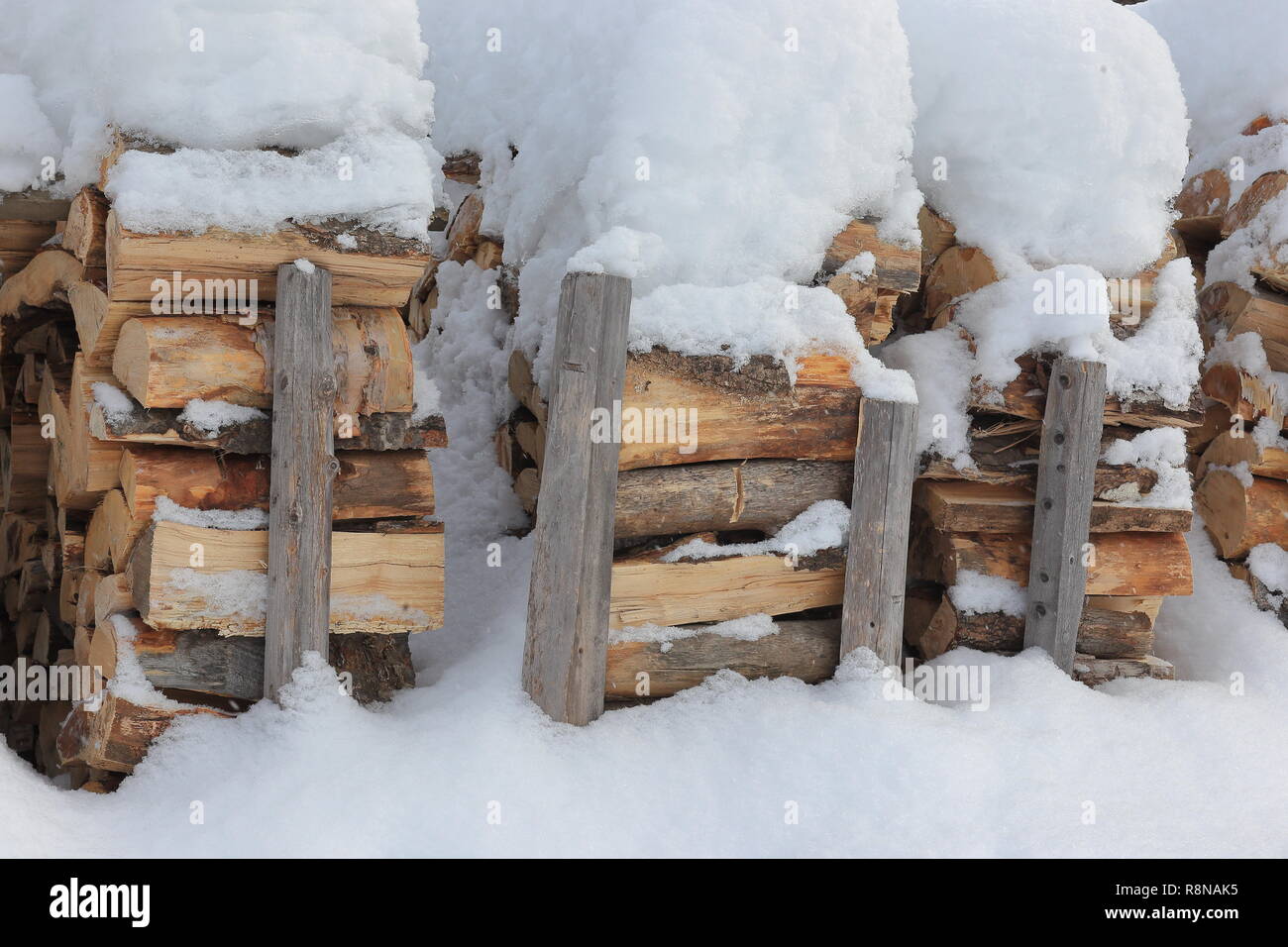 Snow covered firewood hi-res stock photography and images - Alamy