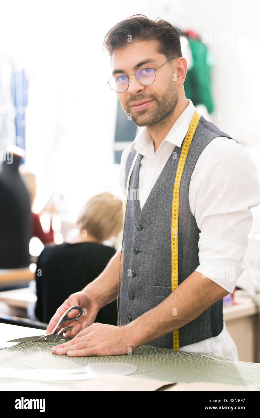 Smiling Tailor in Atelier Stock Photo - Alamy