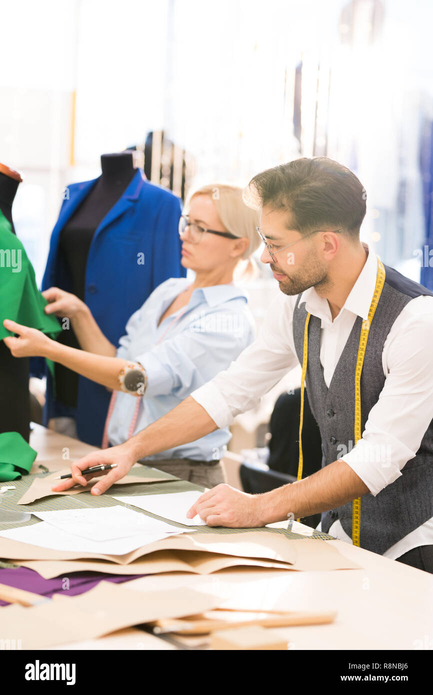 Fashion Designers Working in Atelier Stock Photo - Alamy