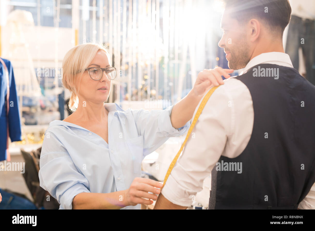 Tailor fitting suit customer hi-res stock photography and images - Alamy