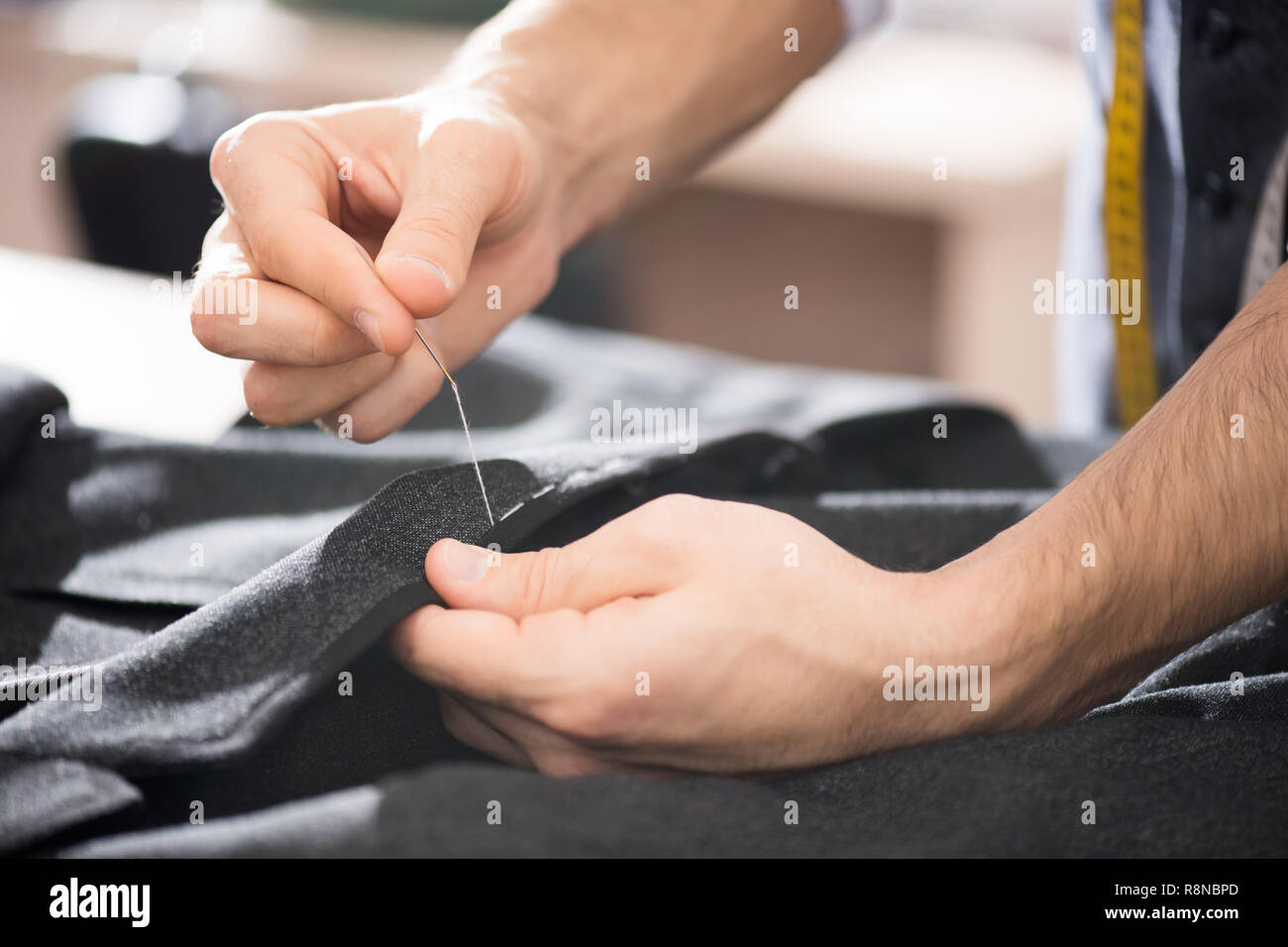 Tailor suit background hi-res stock photography and images - Alamy
